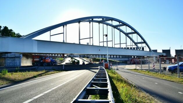 Steel arch bridge Theemsweg route across A15 and N15 successfully ...